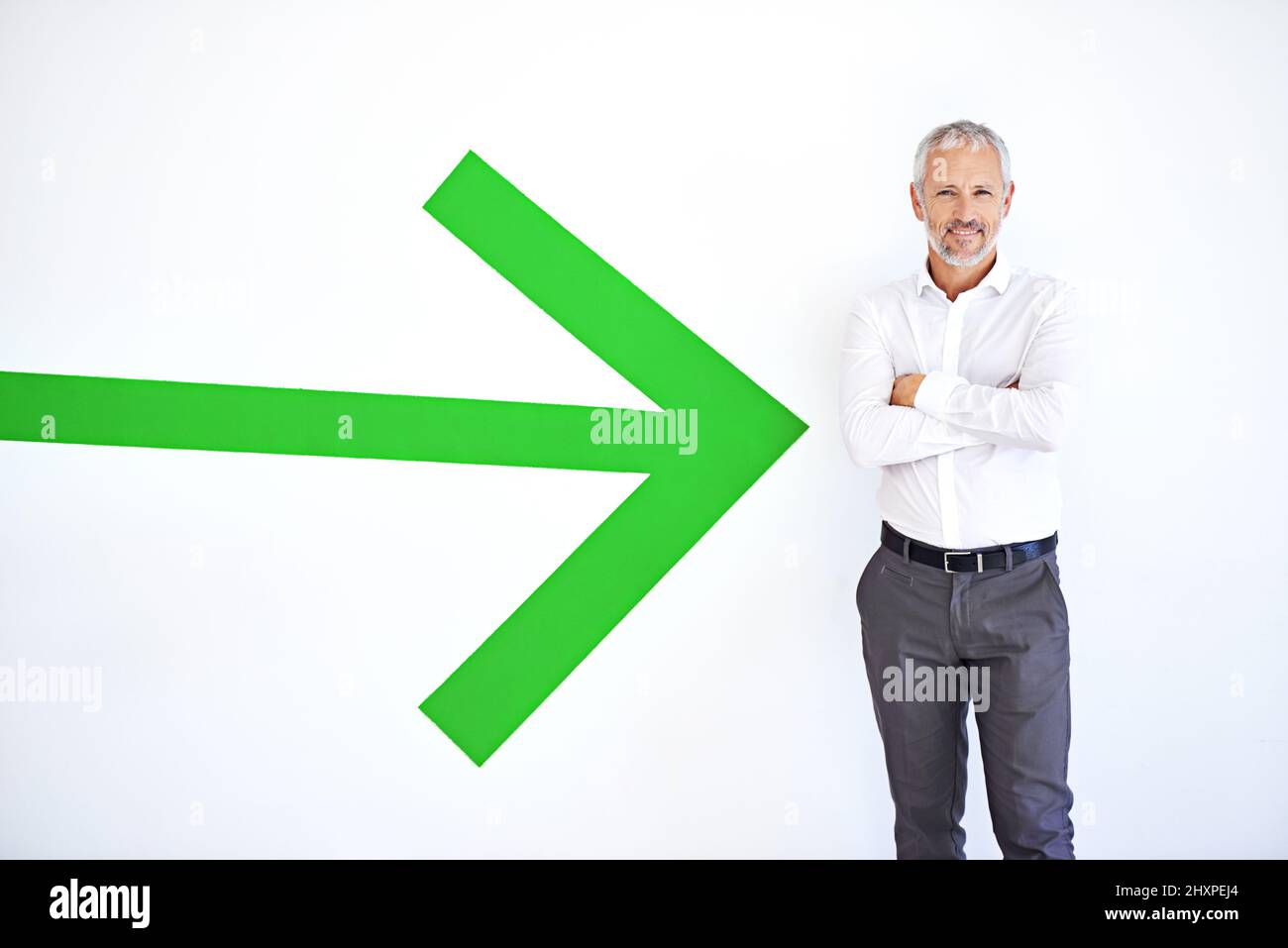 Pointing you to the right man for the job. A mature businessman ...