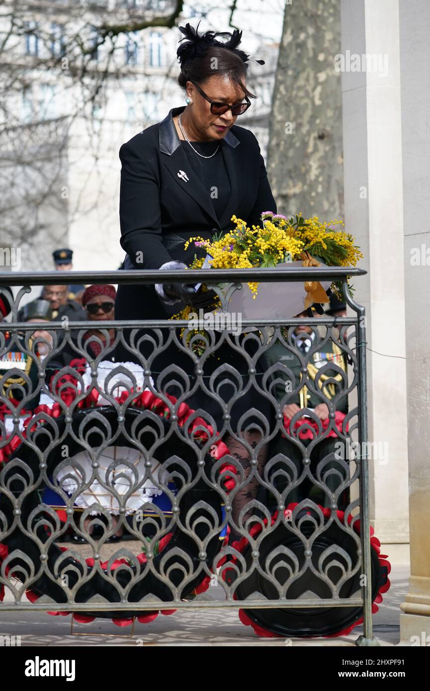 Baroness Scotland lays a wreath during a commemorative ceremony at the ...