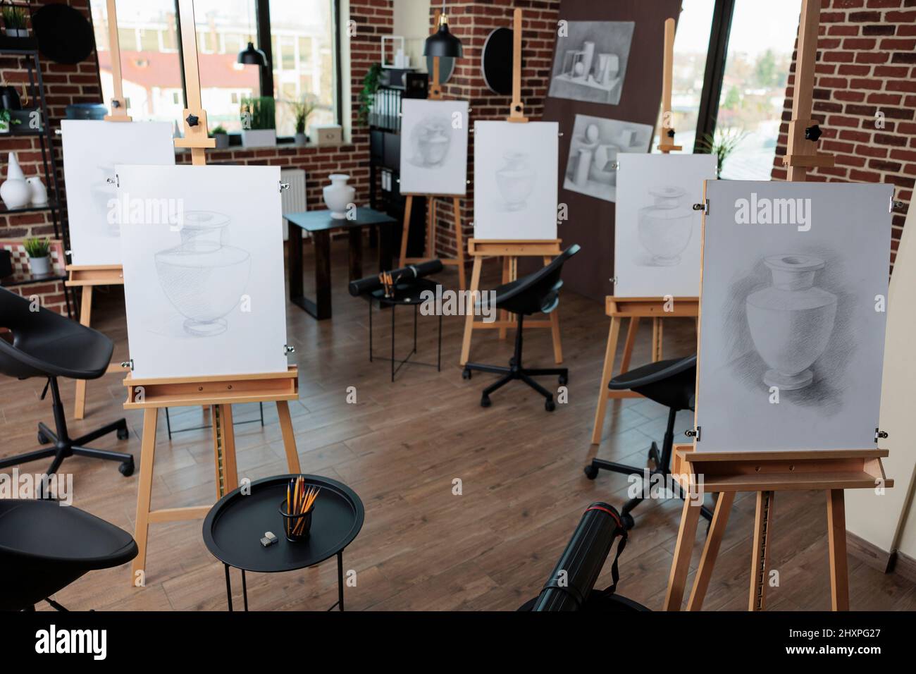 Empty drawing class with nobidy in it prepared for drawing lesson on ...