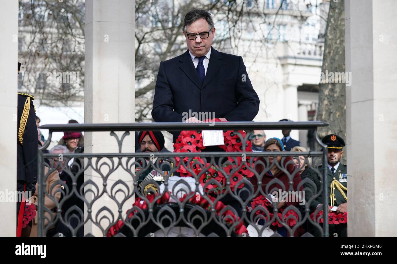 Jeremy Quin, Minister for Defence Procurement lays a wreath at a ...