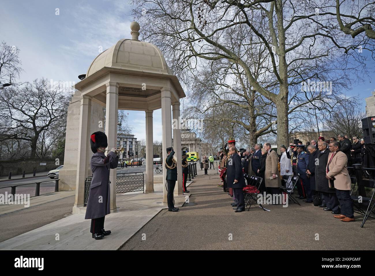 The Last Post is played during a commemorative ceremony and laying of ...