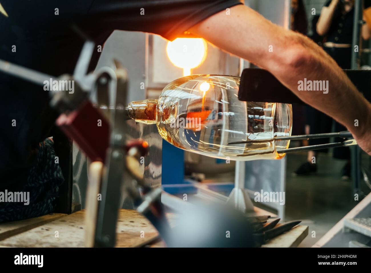 Glass production blowing in traditional industry glass factory Stock ...