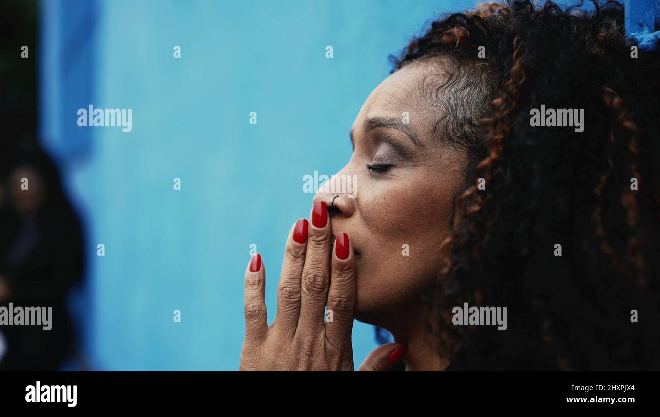 An Anxious African woman having difficult times feeling stressed out ...