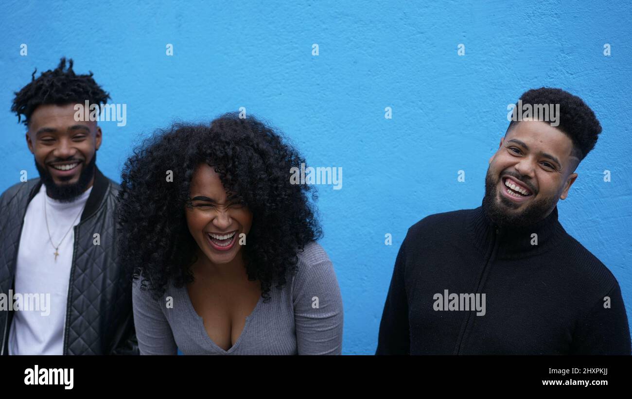 Happy friends laughing and smiling a group of latin people real life ...