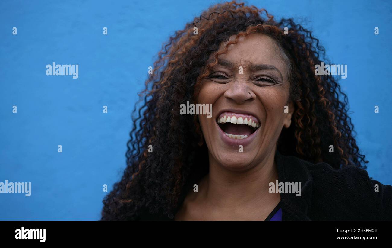 One happy latina hispanic black woman laughing and smiling portrait ...