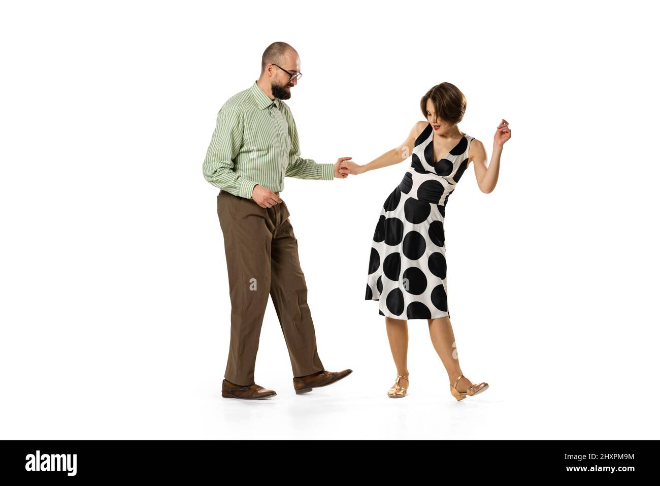 Dynamic portrait of couple of dancers in vintage retro style outfits ...