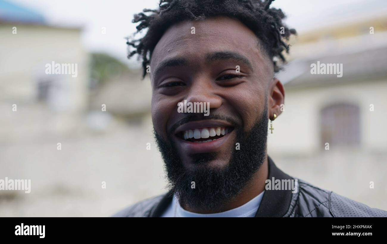 Portrait of a Brazilian man face closeup smiling Stock Photo - Alamy
