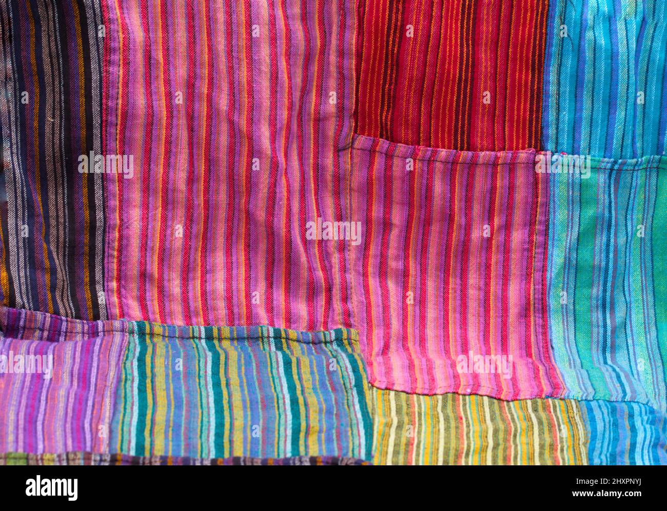 abstract fabric background made in patchwork, reuse, recycling fabric ...