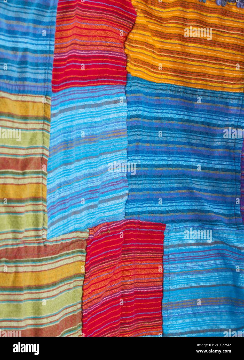 abstract fabric background made in patchwork, reuse, recycling fabric ...