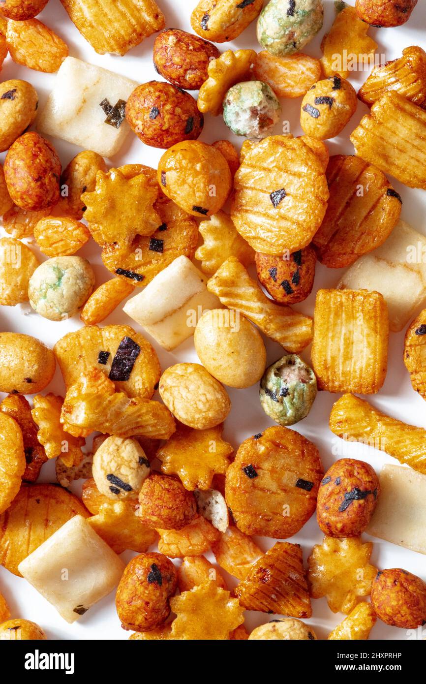 Japanese rice crackers assortment on a white background, shot from ...