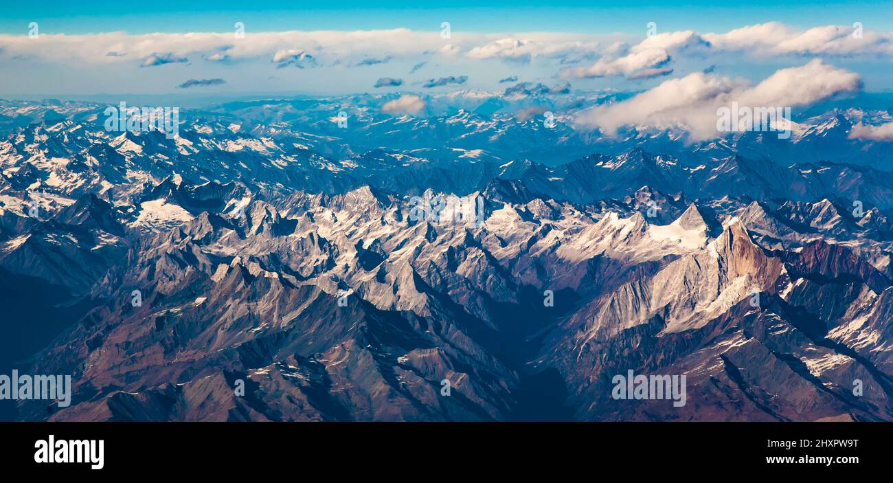 beautiful view from the aircraft to the mountains of the Himalaya on ...