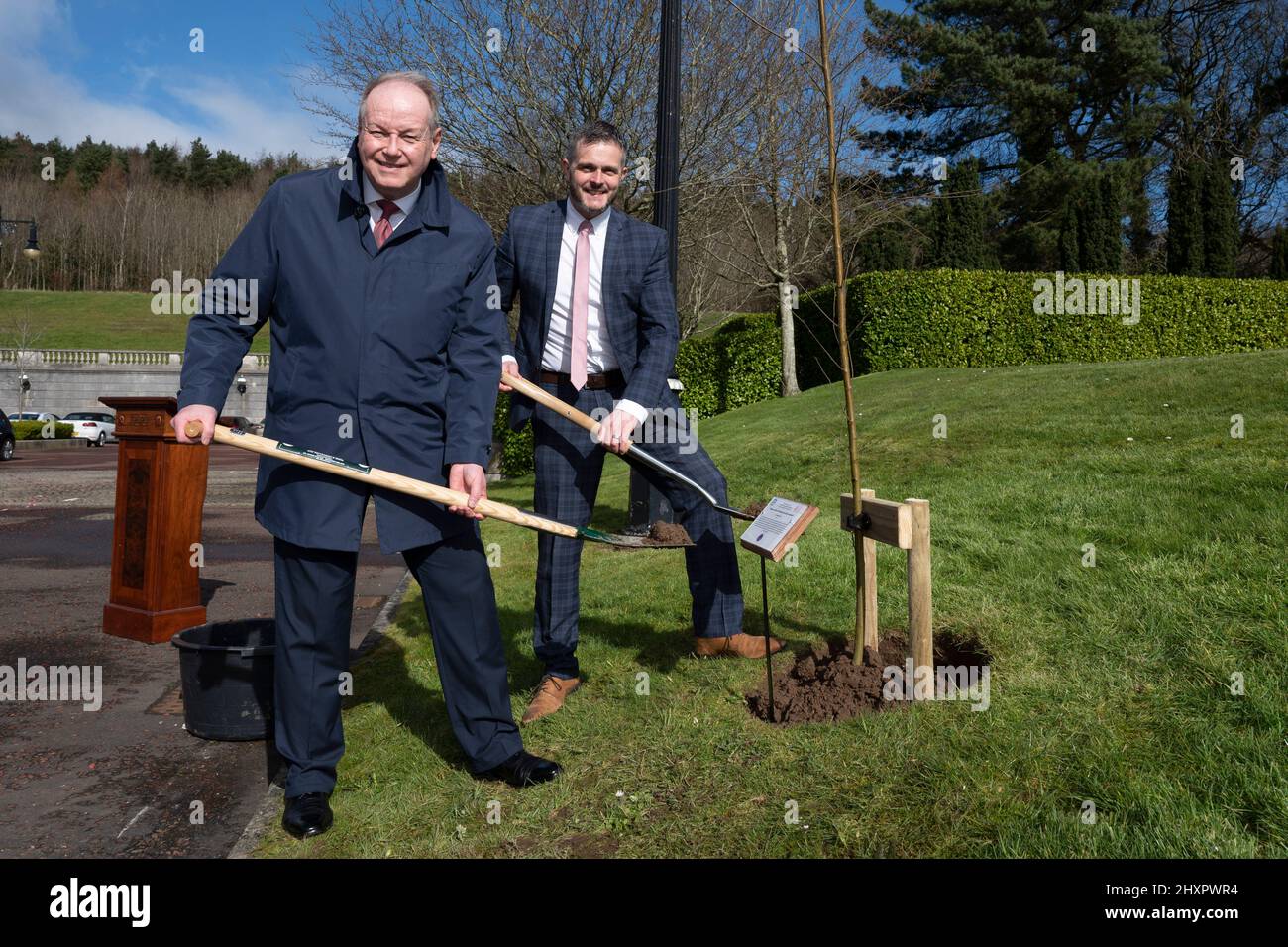 Robbie Butler MLA (right) and William Humphrey MLA plant a tree at ...