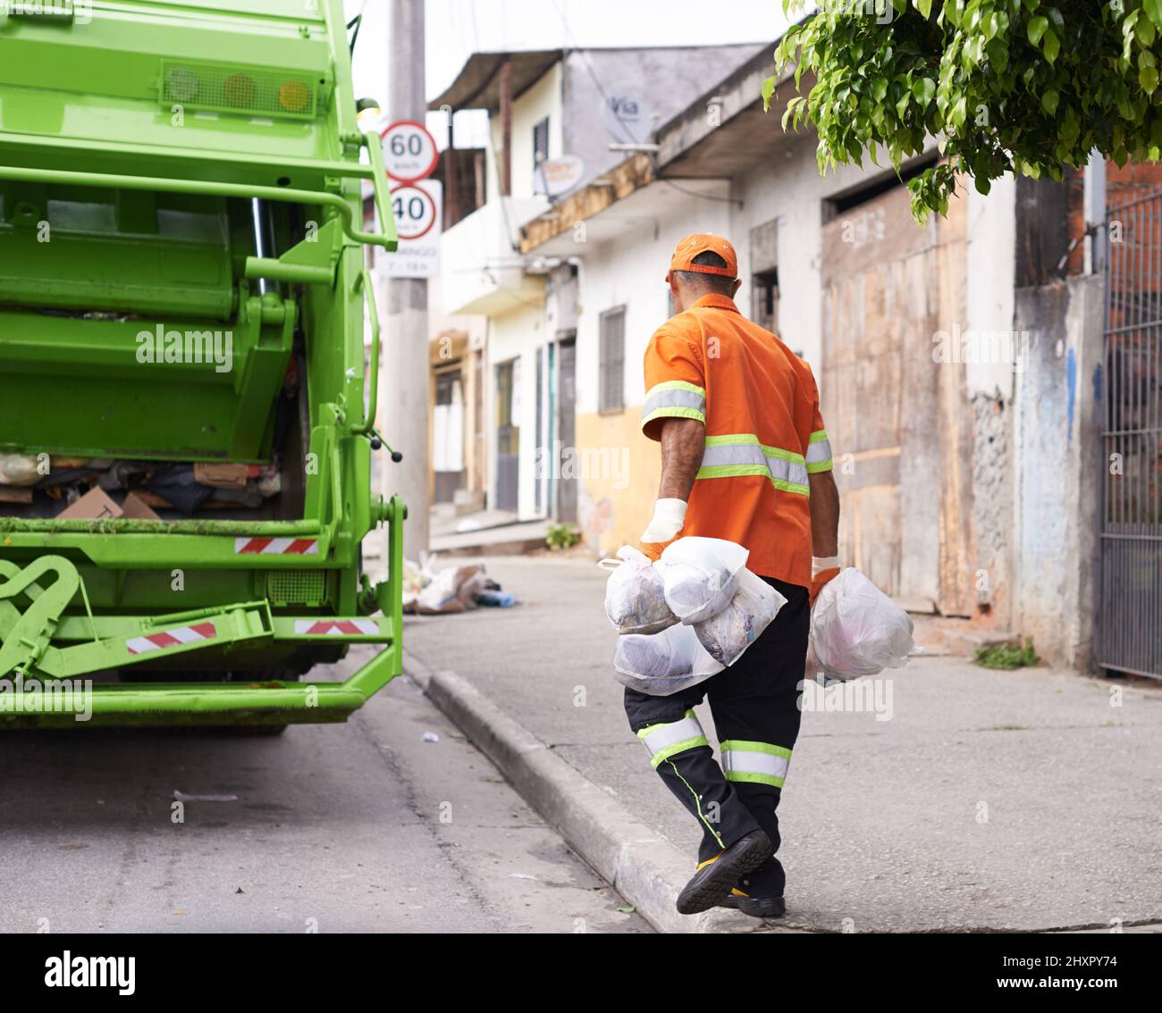 Man worker on construction garbage hi-res stock photography and images ...