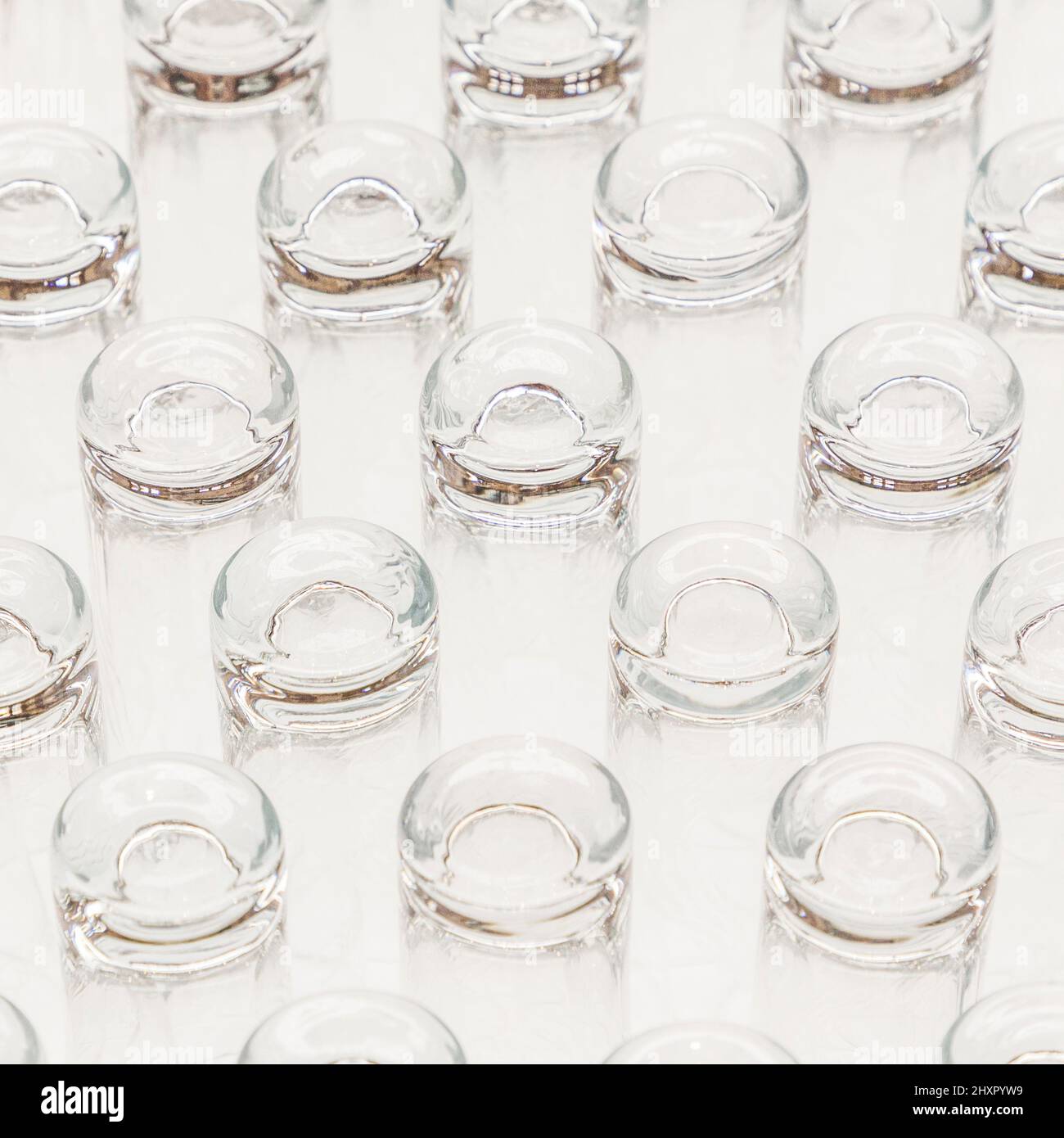 many empty glasses isolated on white background Stock Photo - Alamy