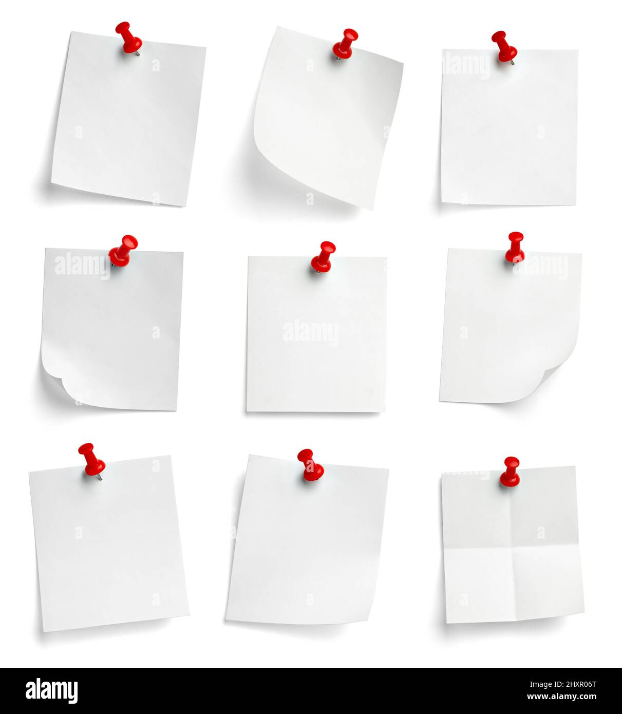 collection of various note paper with a push pin on white background ...