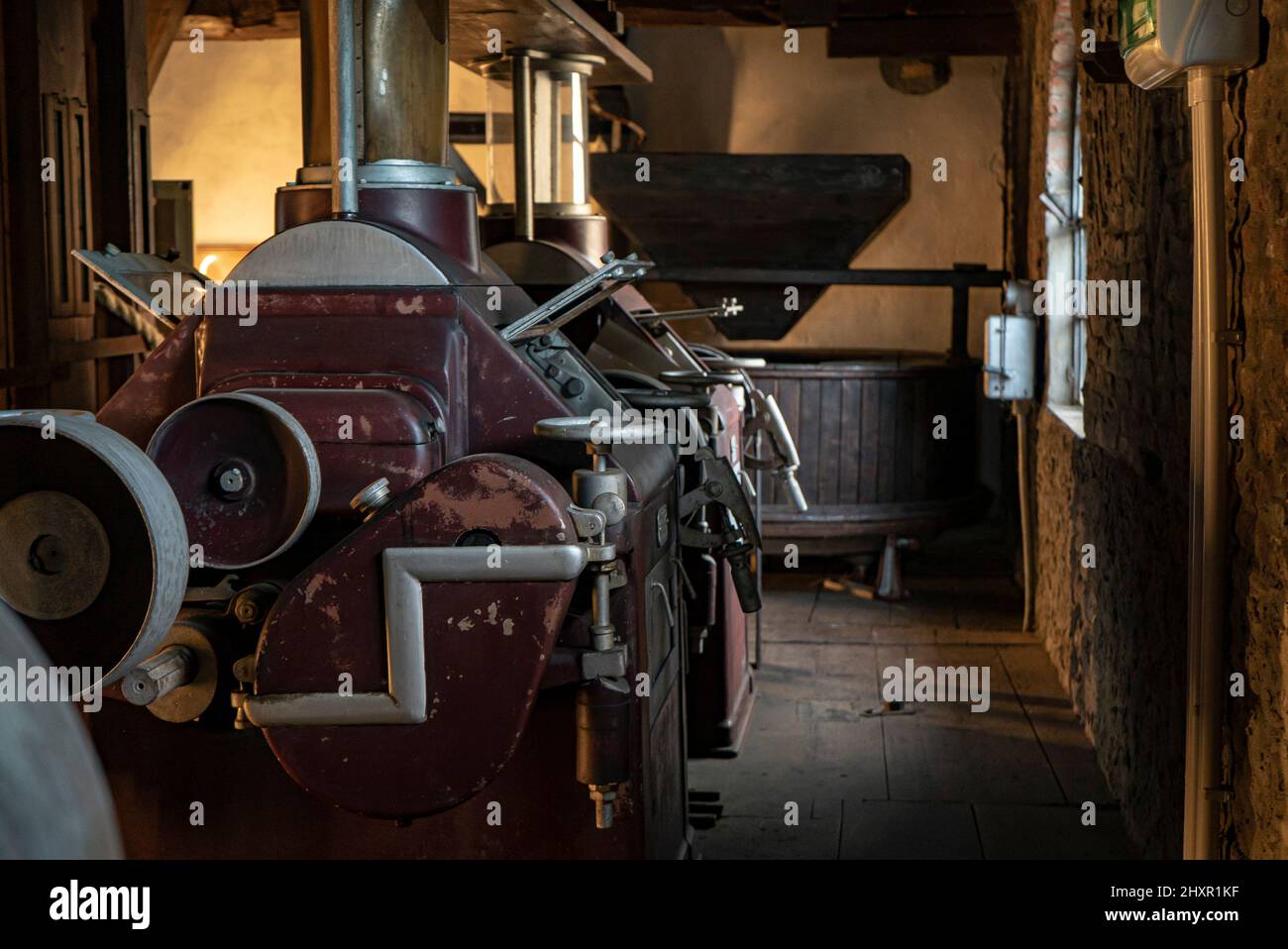 Interior shot of an old historic factory with machinery Stock Photo - Alamy