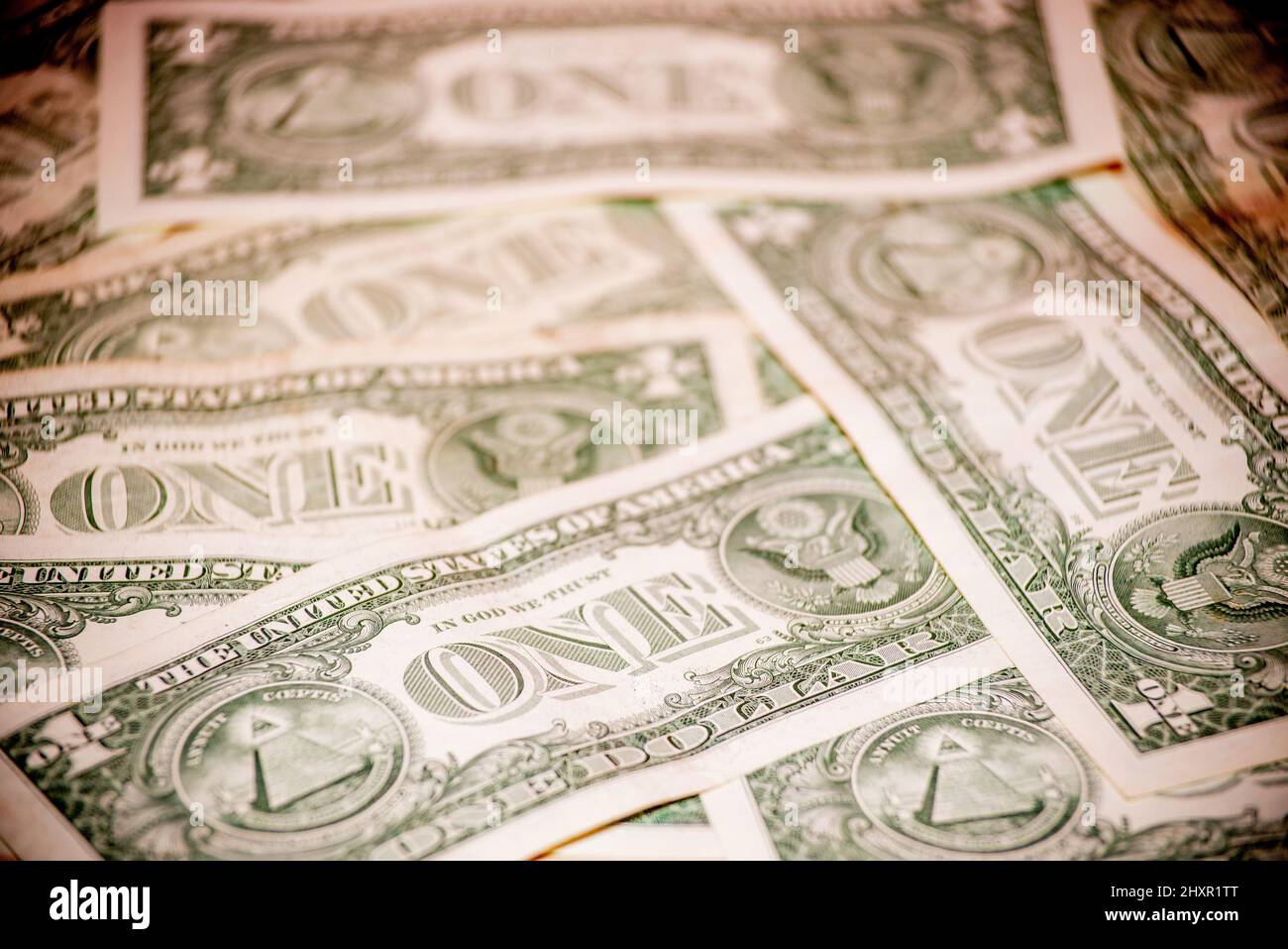 A pile of one US banknotes. Cash of one dollar bills, dollar background ...