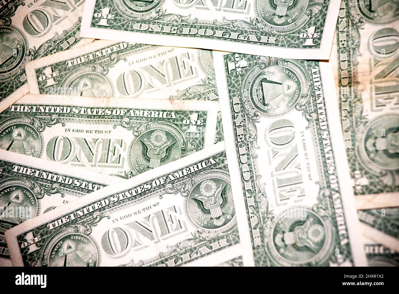A pile of one US banknotes. Cash of one dollar bills, dollar background ...