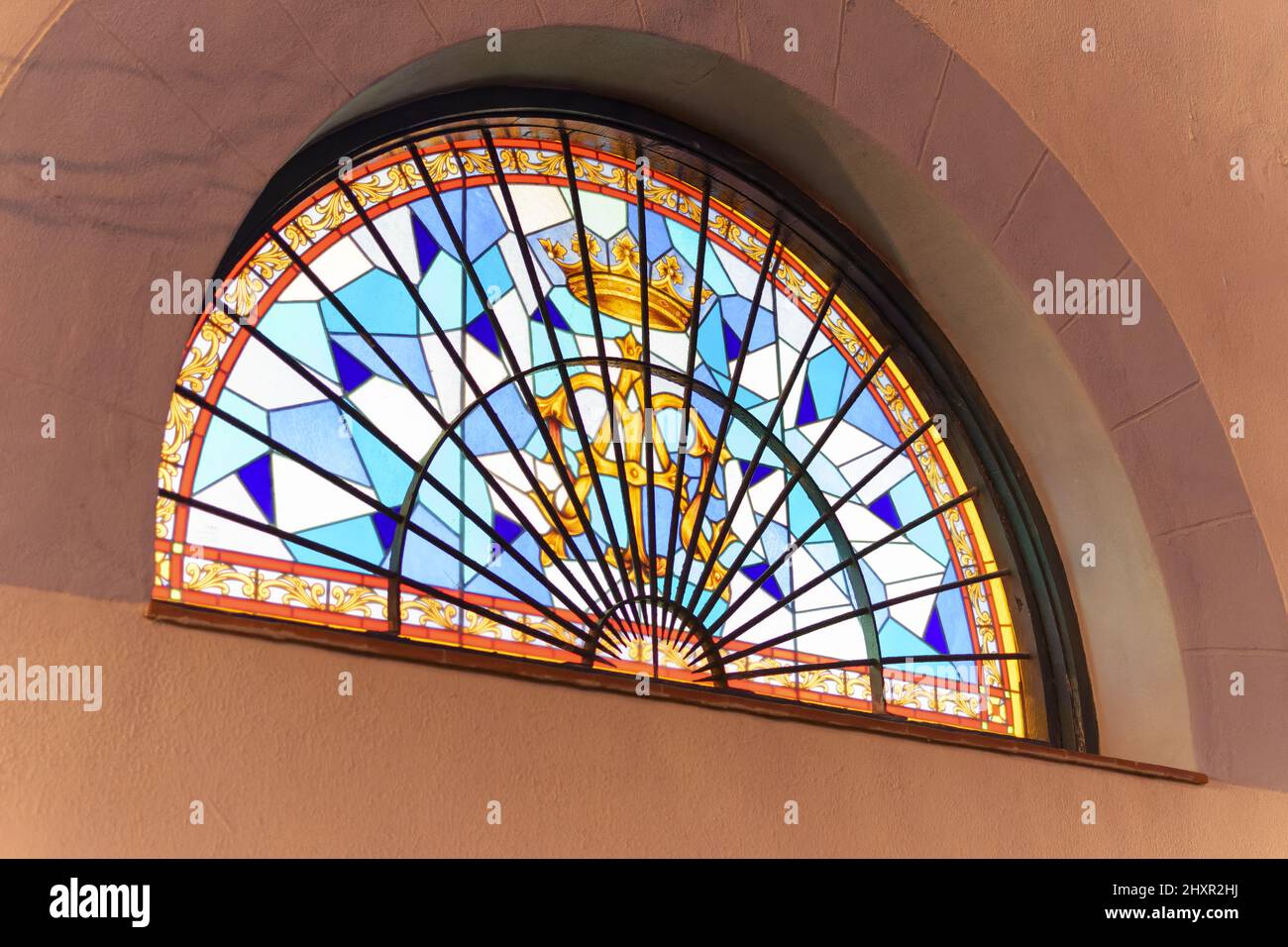 Night view of illuminated stained glass window of the church Stock ...