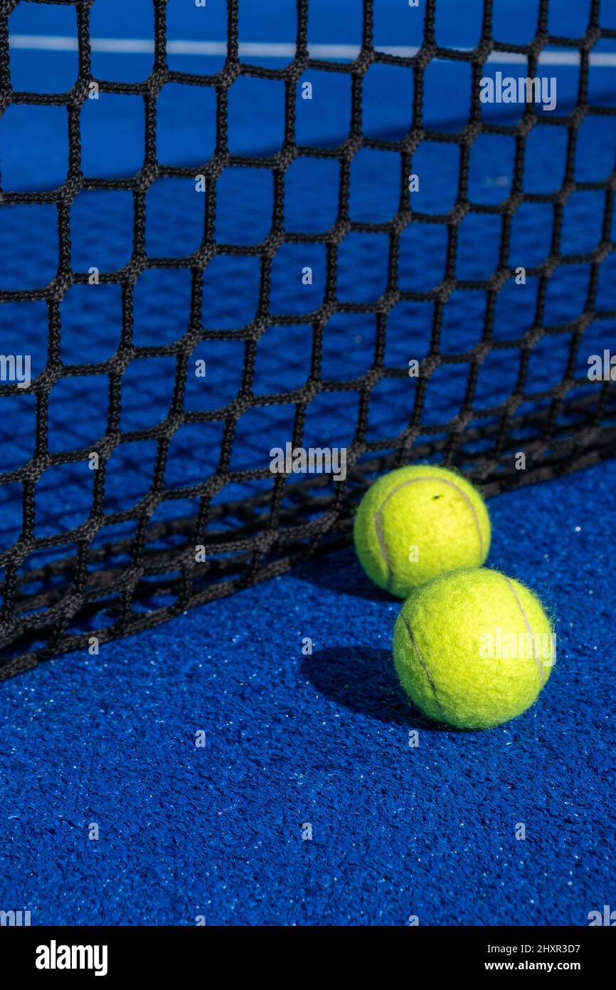 Two paddle balls on the surface of a blue paddle court Stock Photo - Alamy
