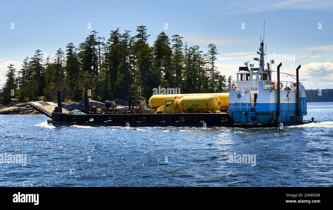A self-propelled ocean barge in choppy waters delivering propane and ...