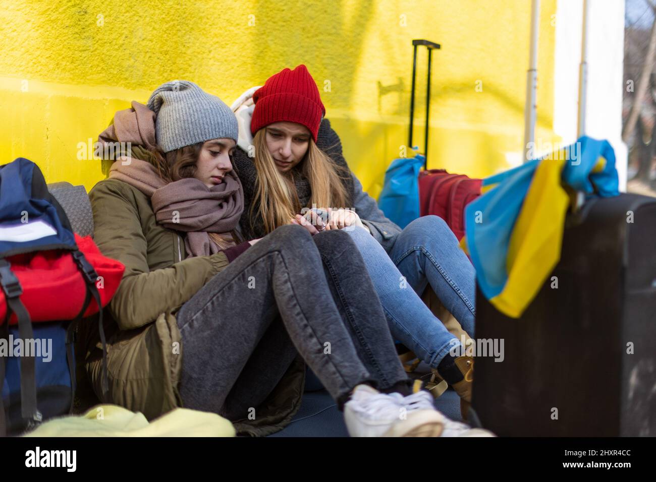 Ukrainian immigrants crossing border and sitting and waiting for ...