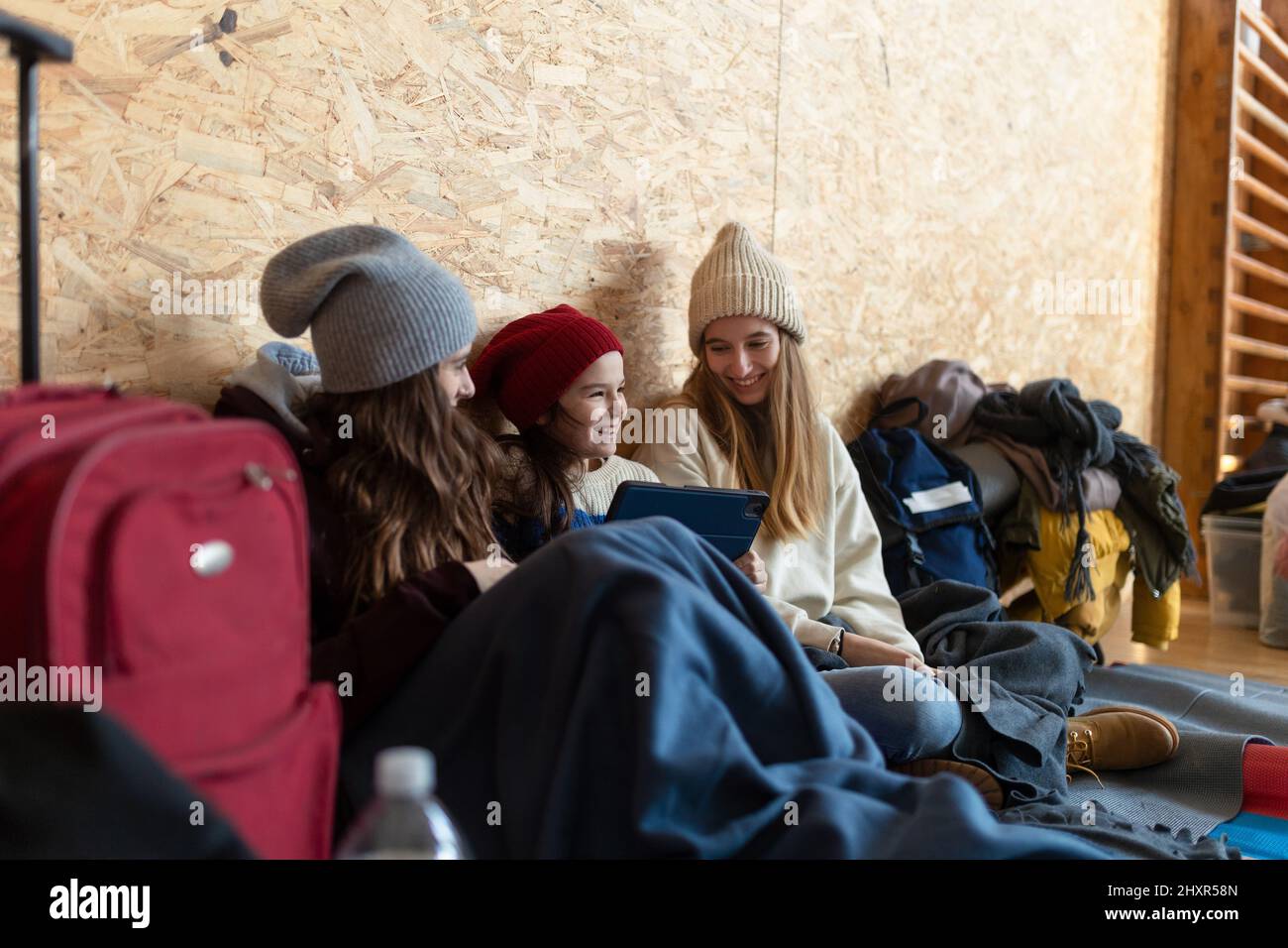 Happy Ukrainian war refugees in temporary shelter and help center ...