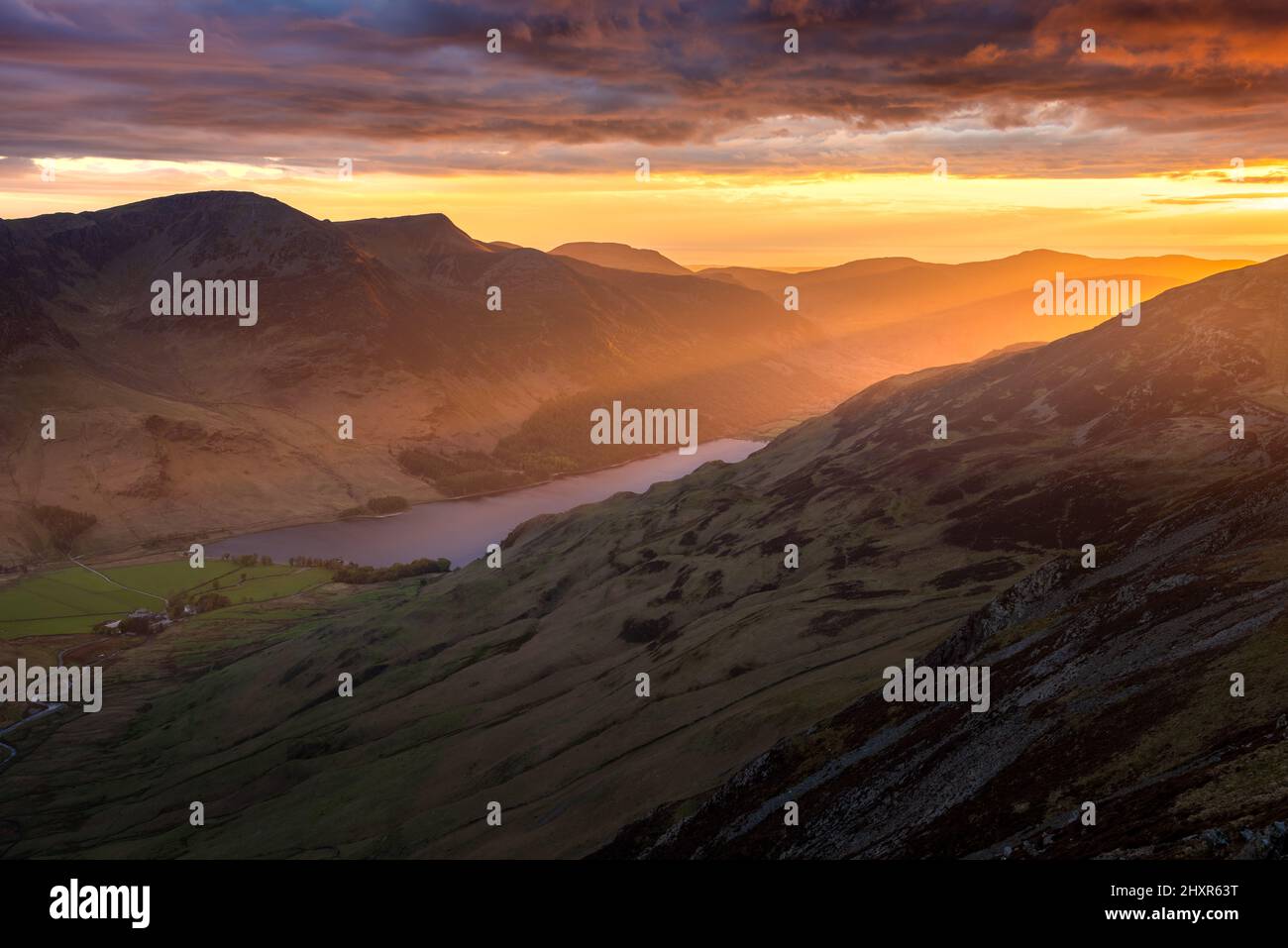 Spectacular Lake District sunset with beautiful glowing rays of light ...