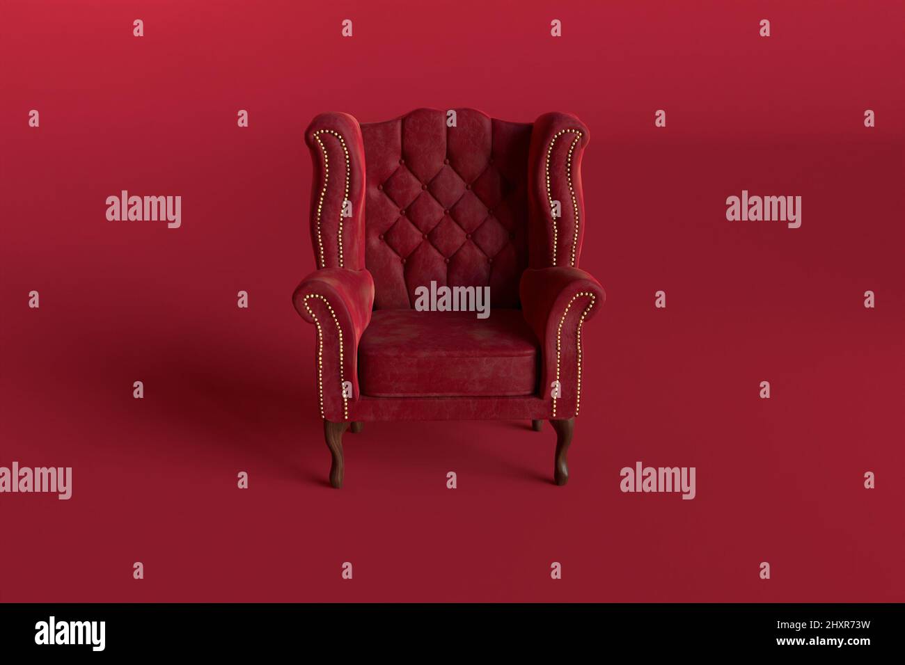 Red Wing back chair on red background Stock Photo - Alamy