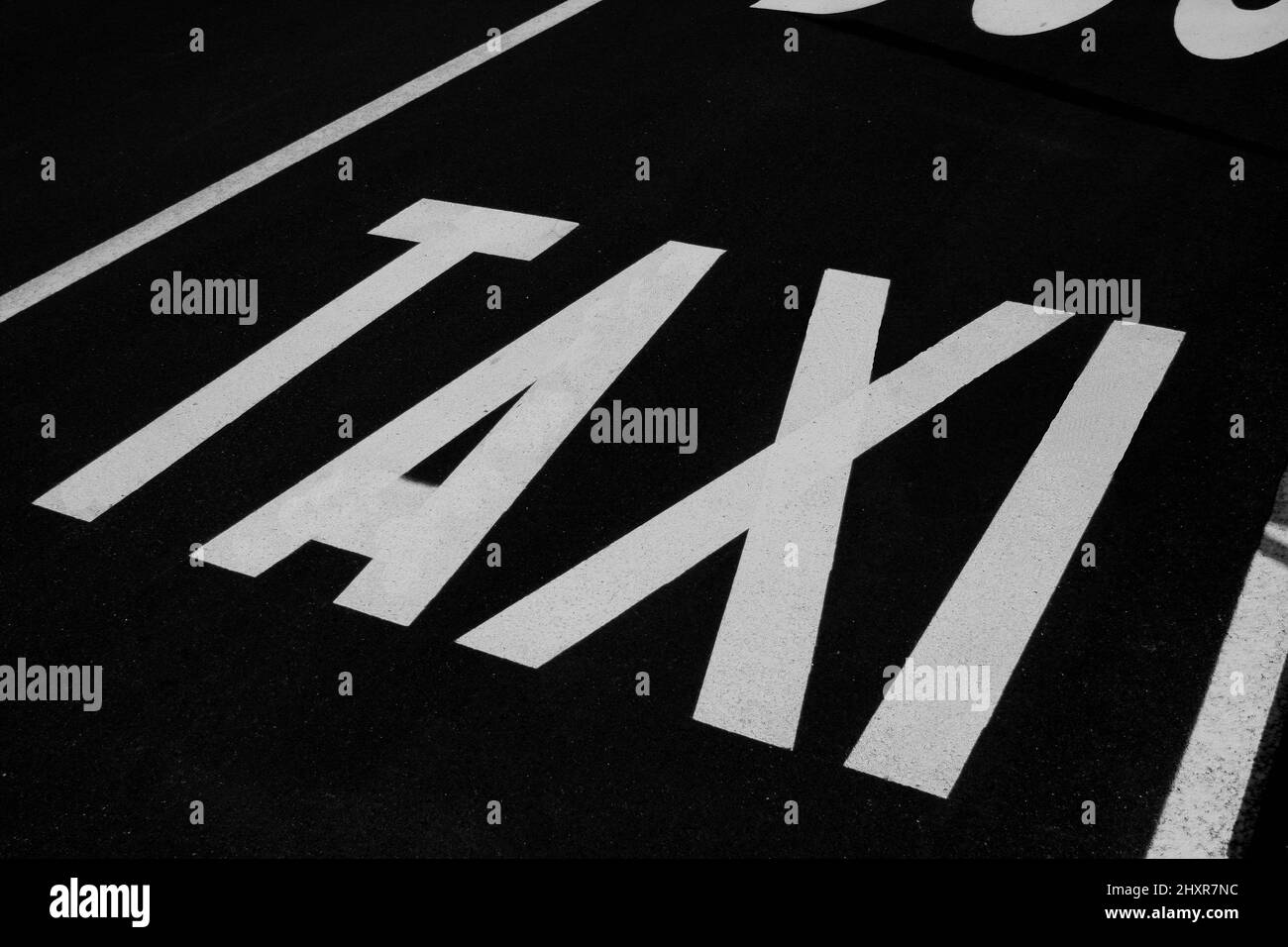 Taxi stop sign on the road Stock Photo - Alamy