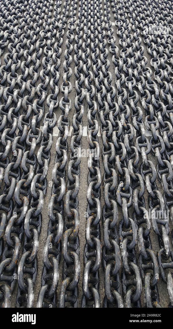 Rusty ship anchor chain in harbour Stock Photo - Alamy