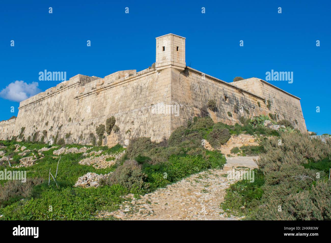 Watch tower on walls of Fort Chambray, in Gozo, Malta, built to protect ...