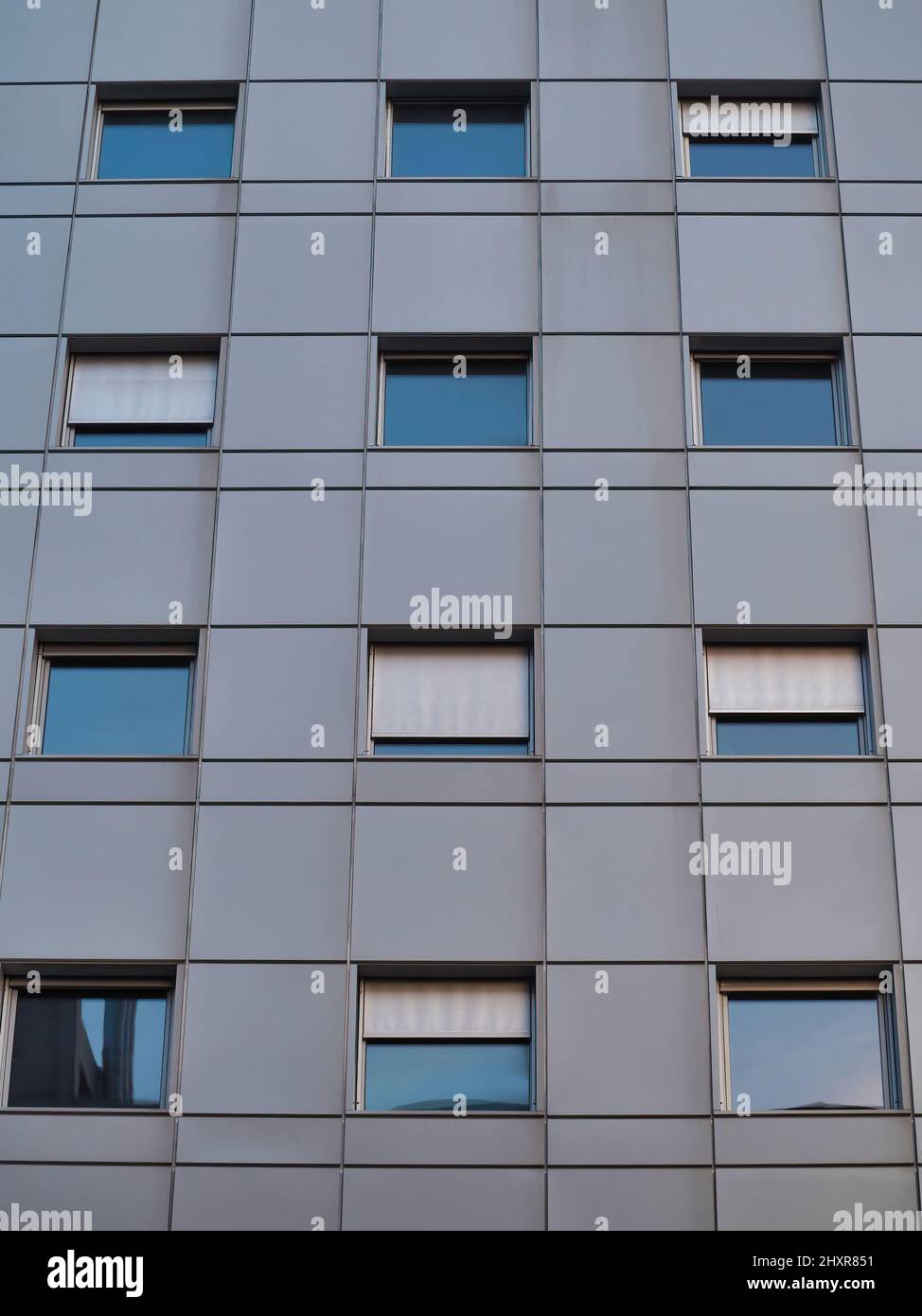 Vertical shot of the external view of the modern high building with ...