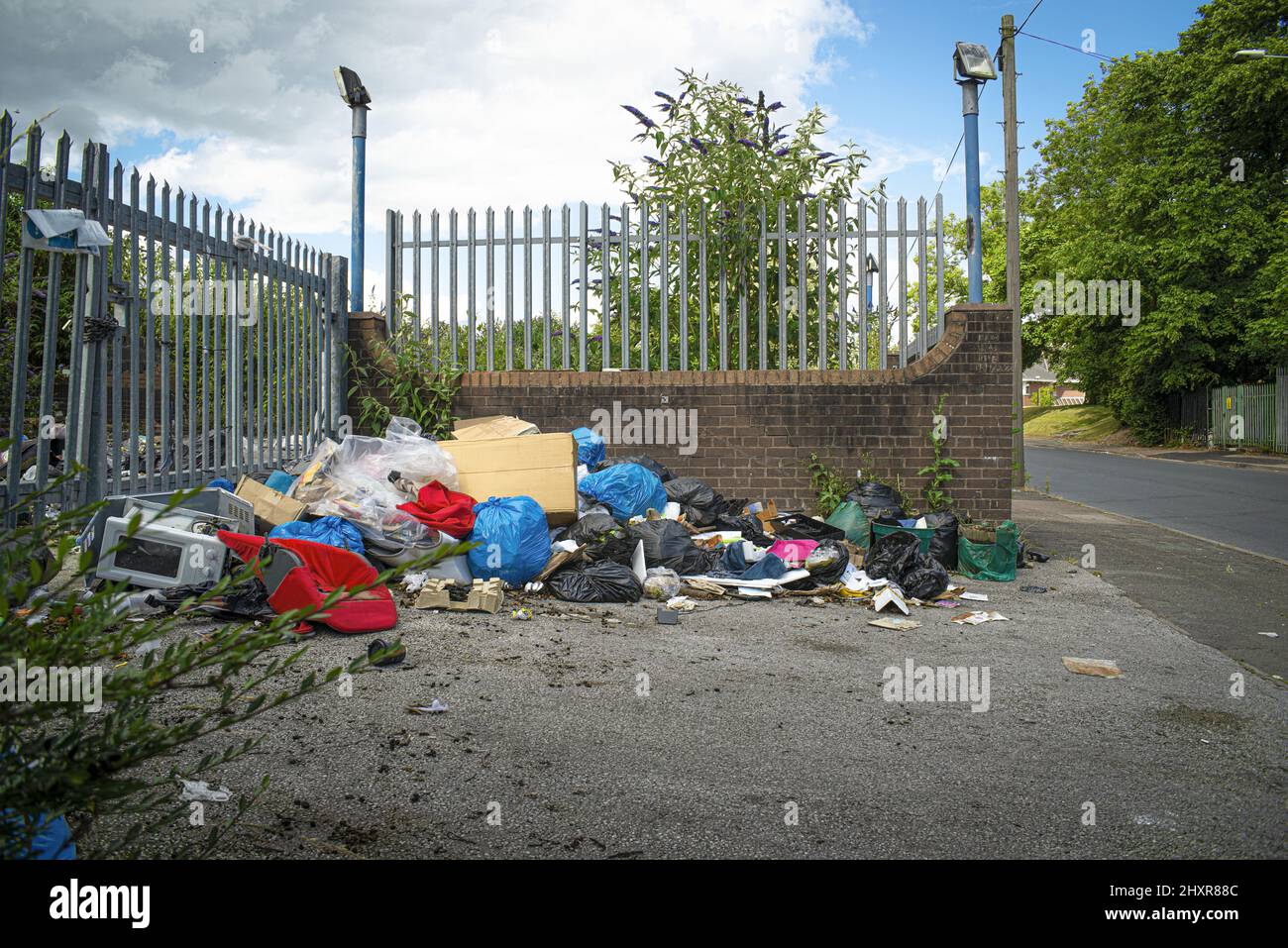 Garbage dumped in urban stree Stock Photo - Alamy