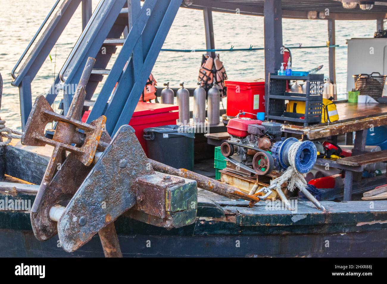 A diesel engine with a rope for raising and lowering a ship's anchor on ...