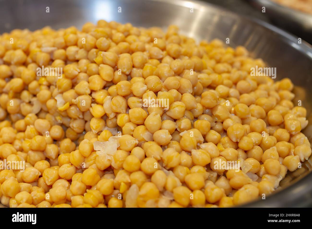 Chickpea cooked on an aluminum container Stock Photo - Alamy