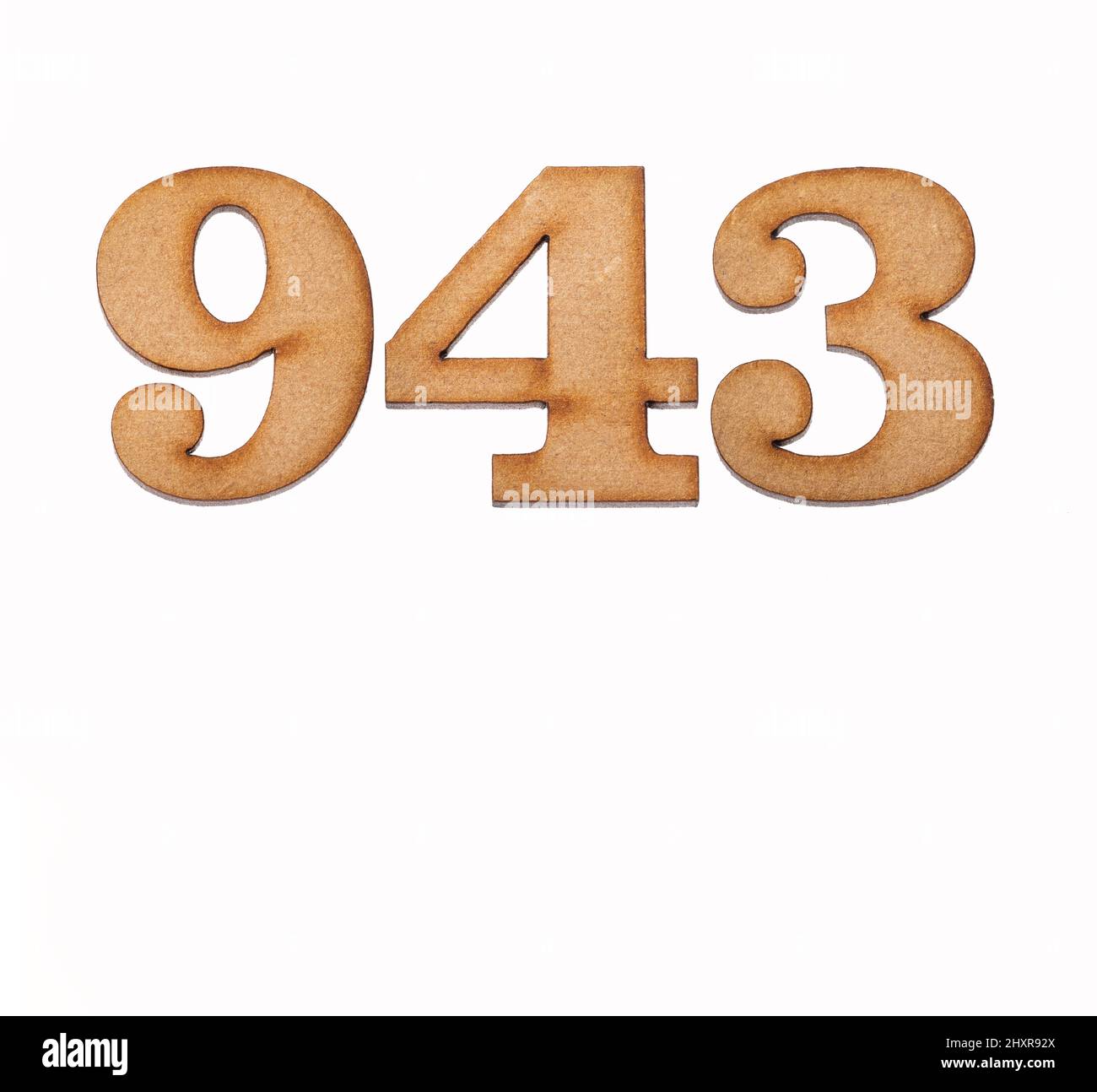 Number 943 in wood, isolated on white background Stock Photo - Alamy