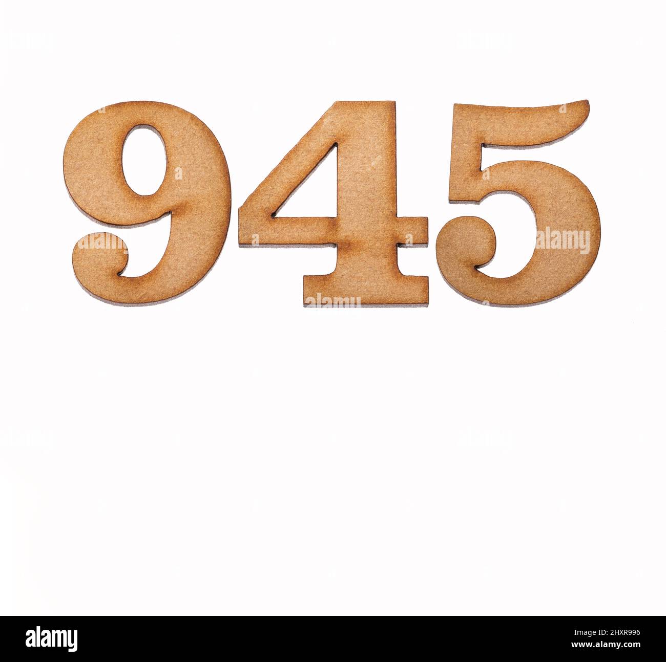 Number 945 in wood, isolated on white background Stock Photo - Alamy
