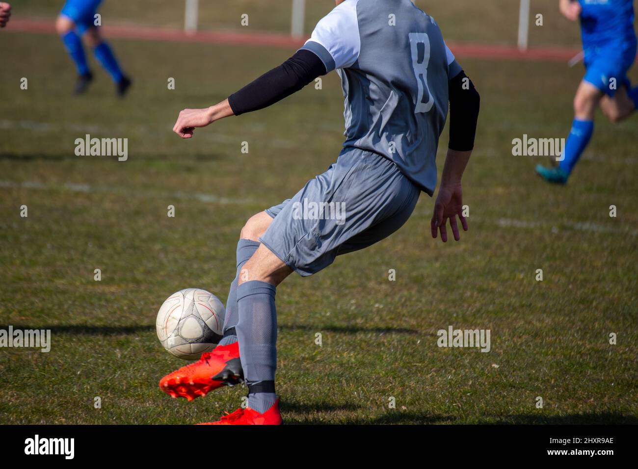 Symbol image of amateur football: Close-up of a football player Stock ...