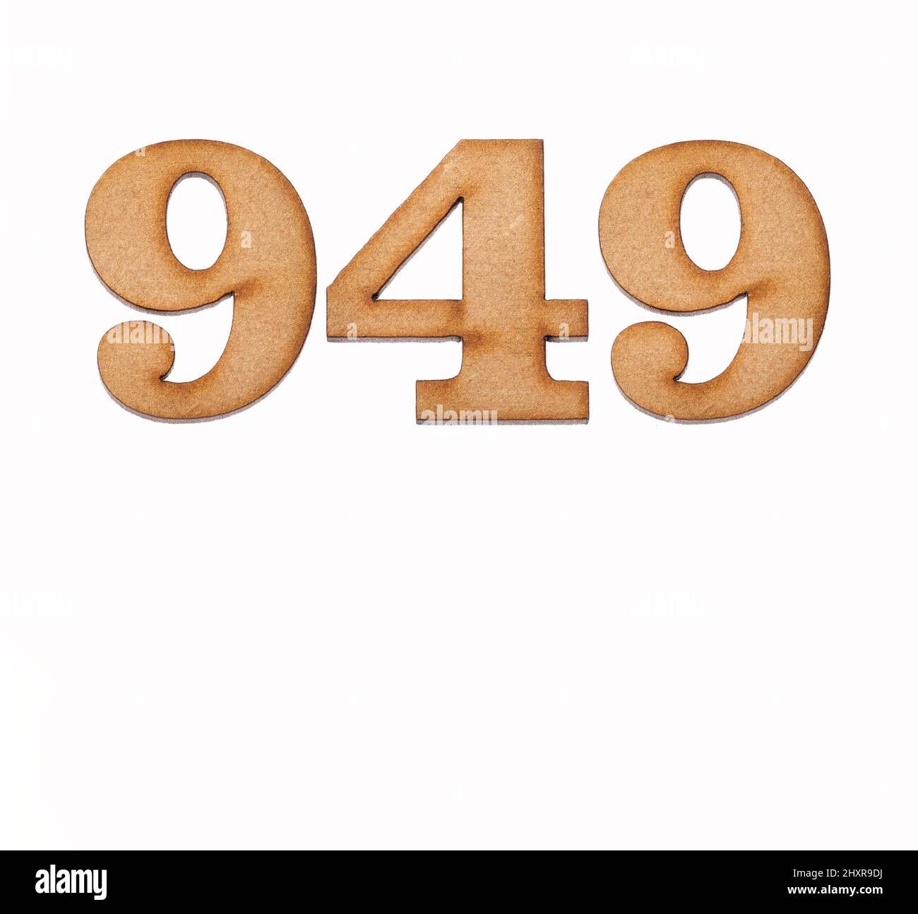 Number 949 in wood, isolated on white background Stock Photo - Alamy