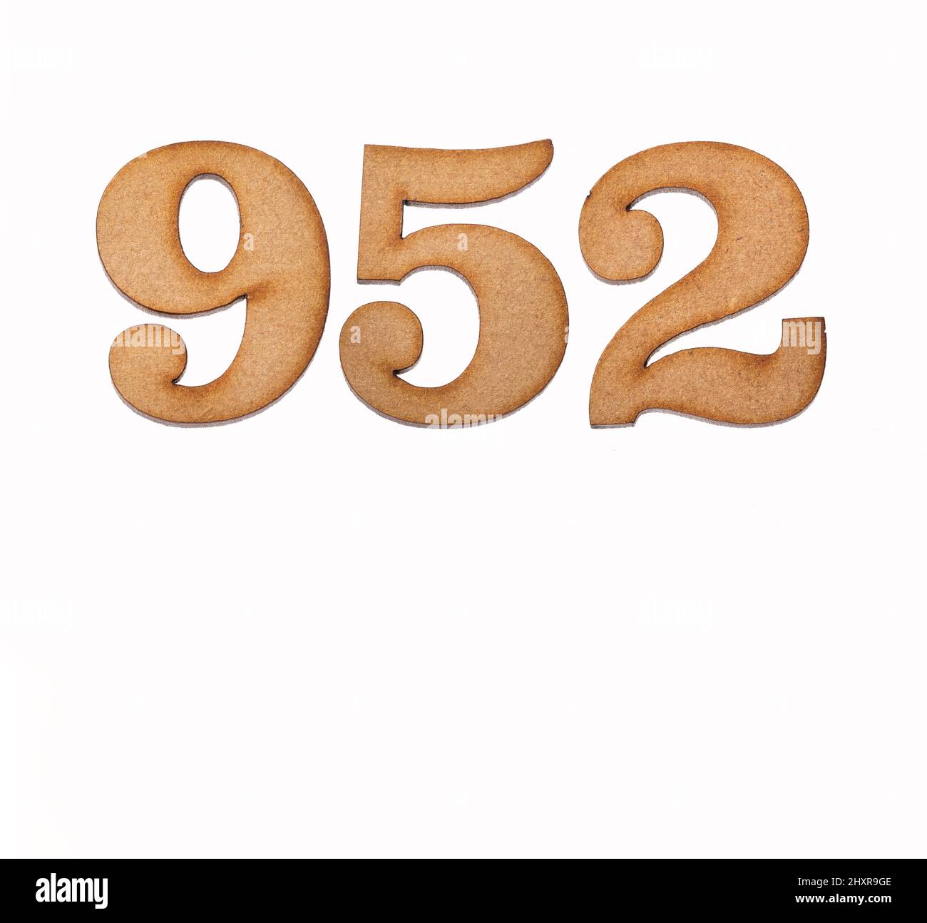 Number 952 - Piece of wood isolated on white background Stock Photo - Alamy
