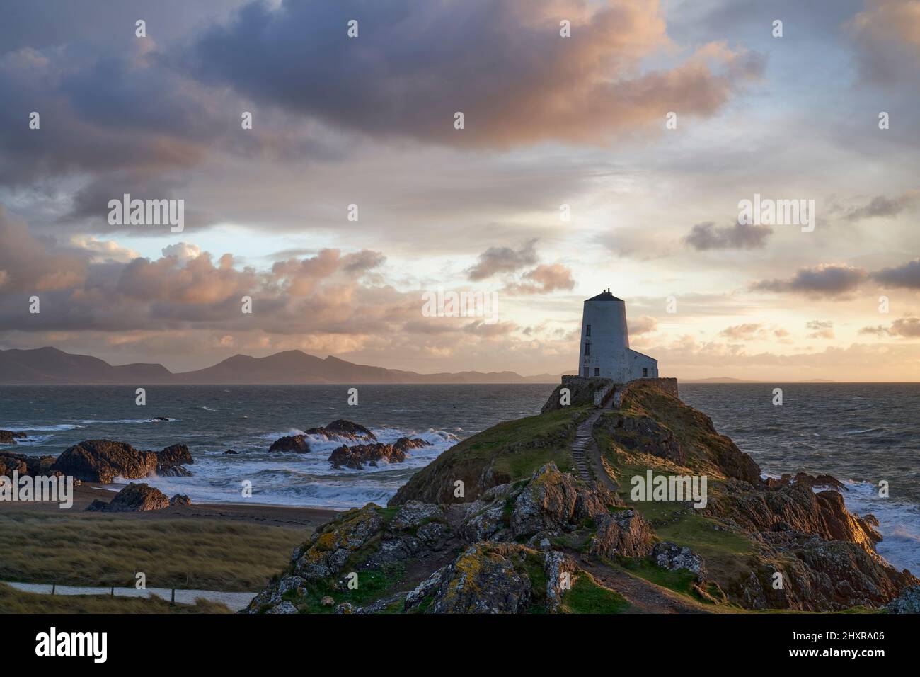 Twr Mawr Lighthouse at sunset Stock Photo - Alamy