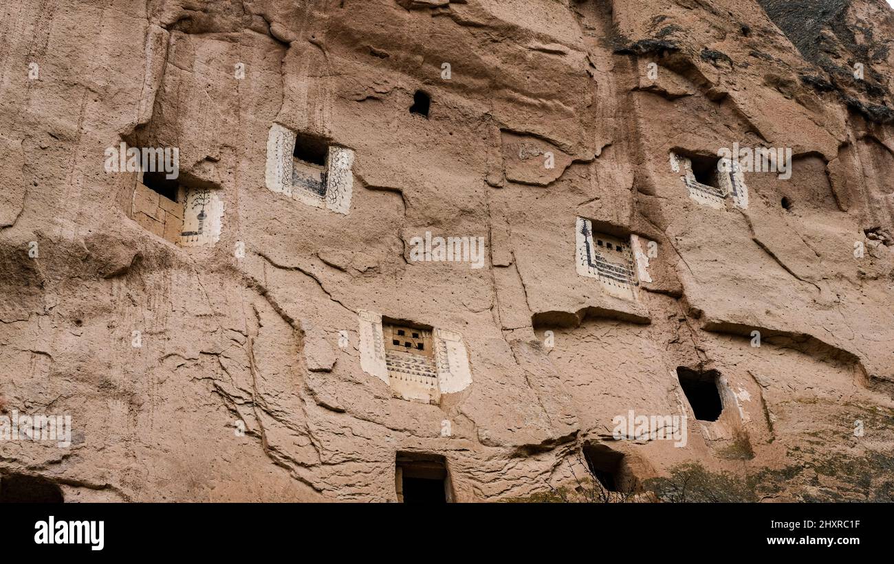 Geological formations and homes built in Cappadocia, Turkey Stock Photo ...