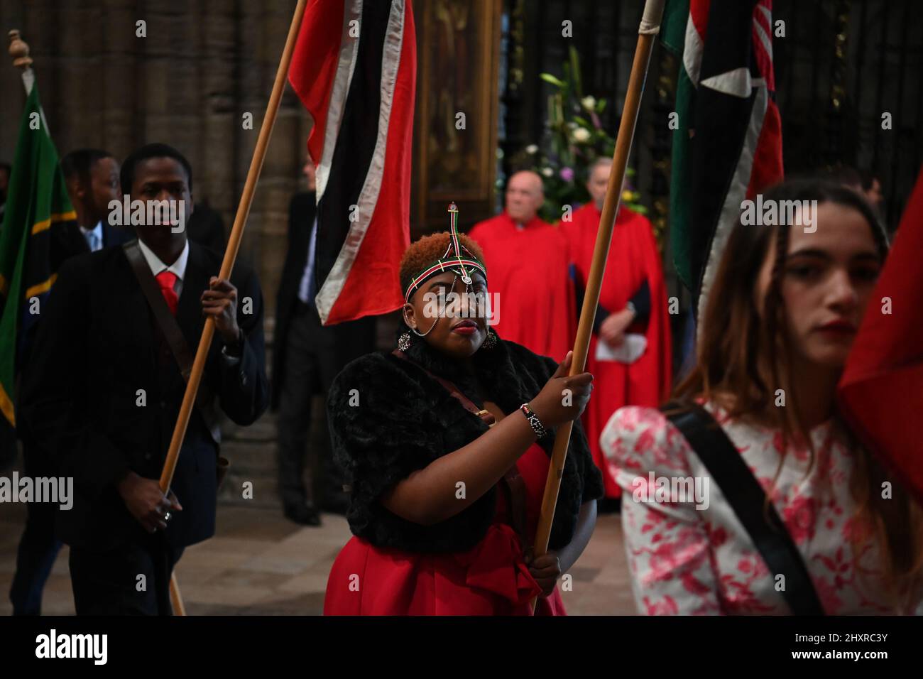 The flag bearers parade at the Commonwealth Service at Westminster ...