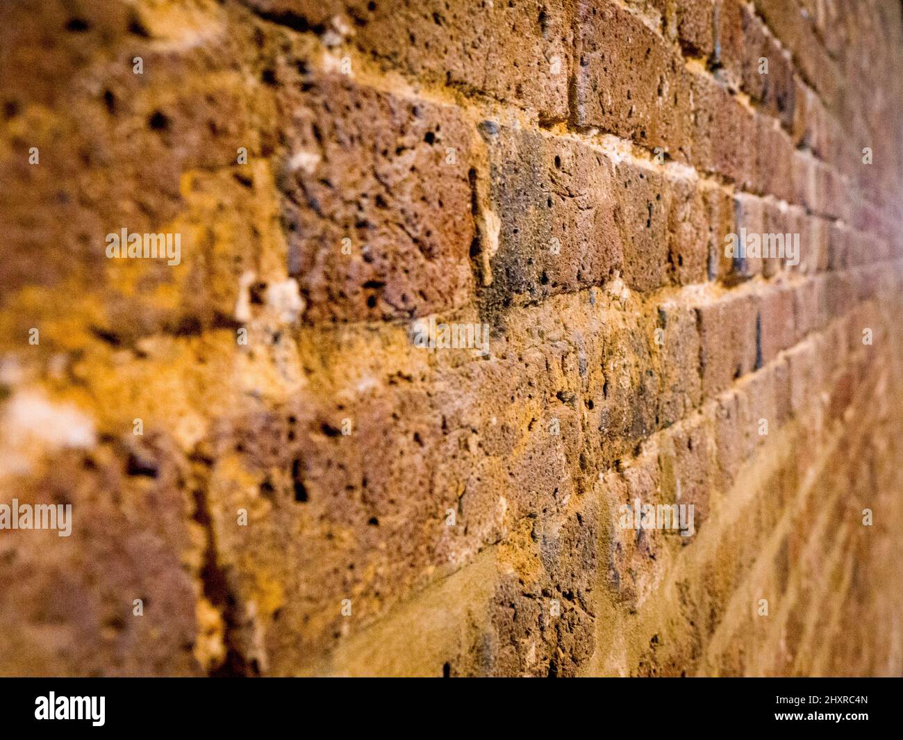 Closeup shot of a worn brick wall Stock Photo - Alamy