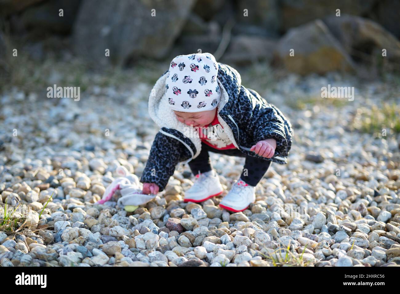 Child playing stones ground hi-res stock photography and images - Alamy