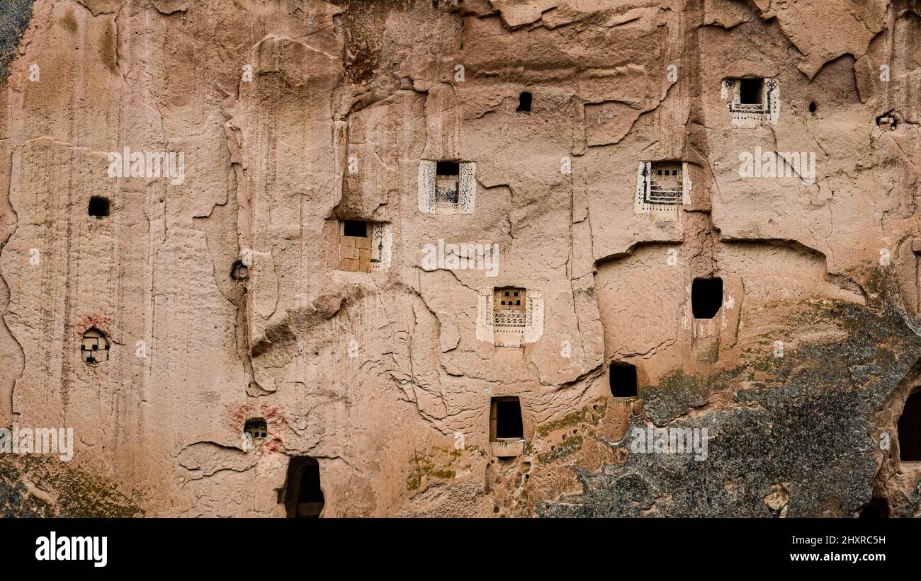 Geological formations and homes built in Cappadocia, Turkey Stock Photo ...