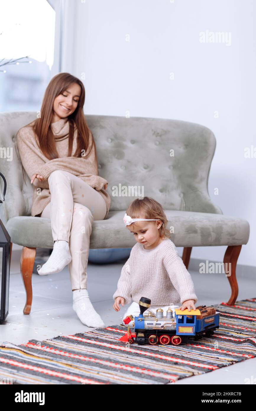 mothers day. Portrait of little preschool girl kid excited young mother ...