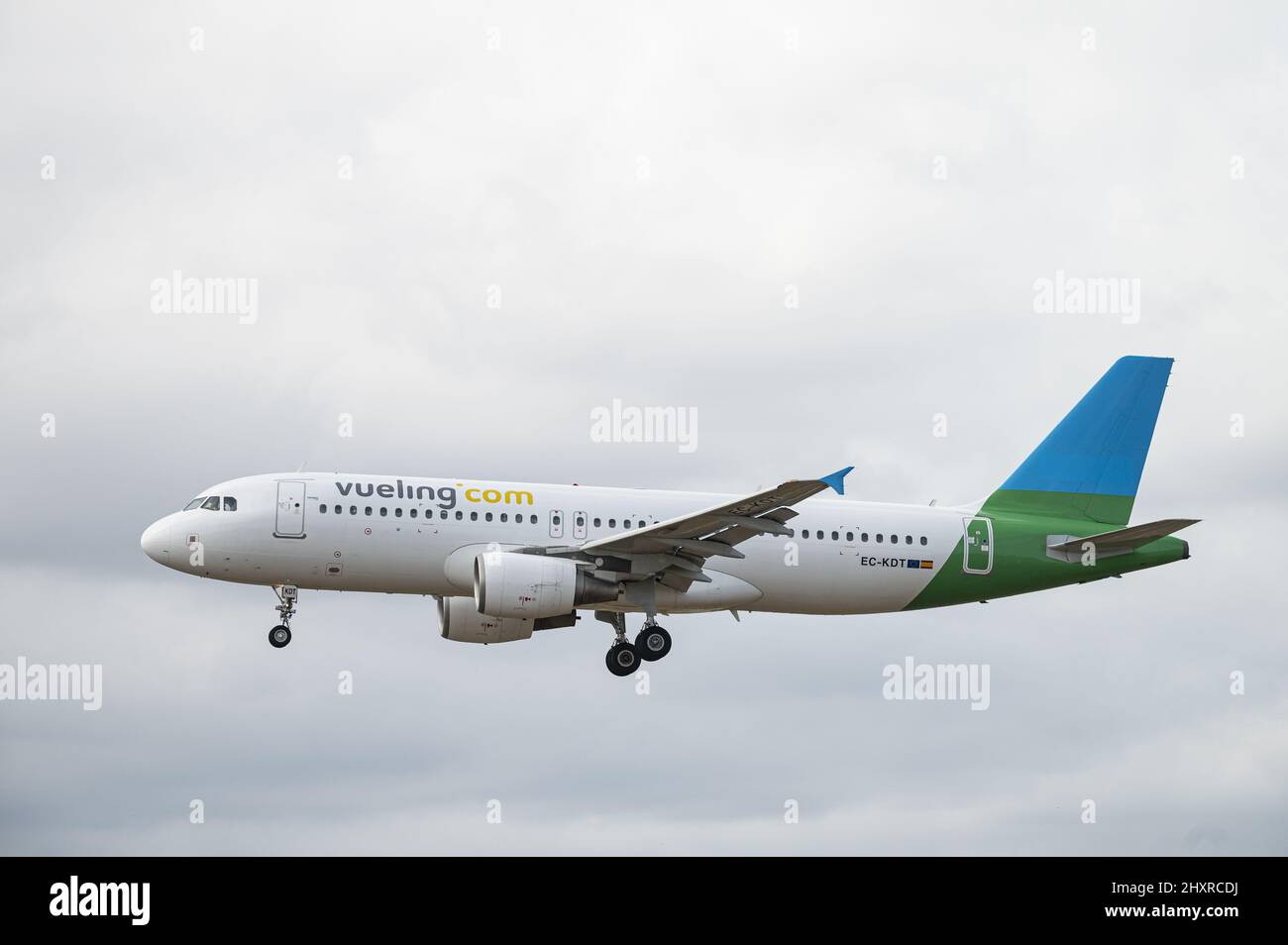 Airbus A320 Vueling - a passenger plane in the sky near Barcelona ...