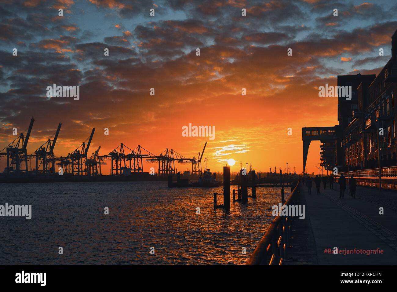 Industrial background with bright sunset Stock Photo - Alamy